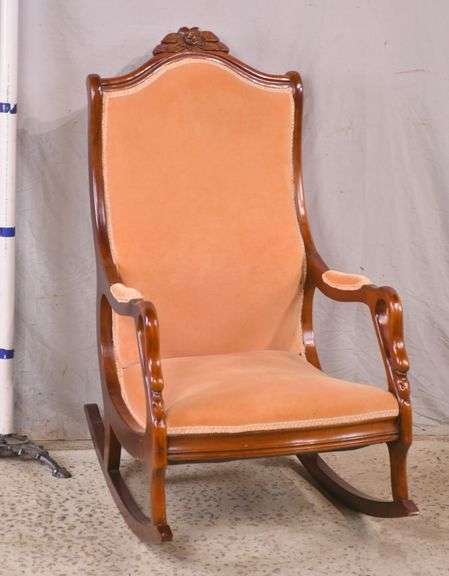 Carved swan head open arm rocking chair with peach color fabric; 253 ...