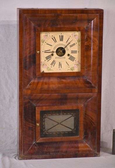 Forestville Manufacturing Co. early ogee clock with crotch mahogany ...