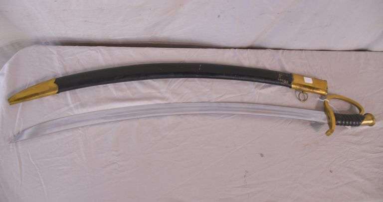 Large sword with leather wrapped brass handle and wooden sheath with ...