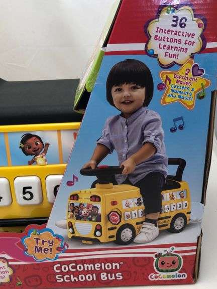 CoComelon school bus ride on toy - Lexington Online Auction