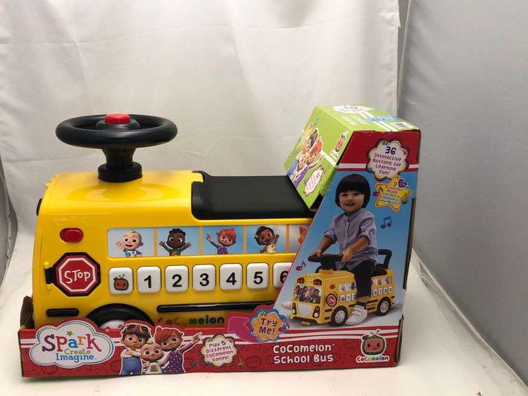 CoComelon school bus ride on toy - Lexington Online Auction