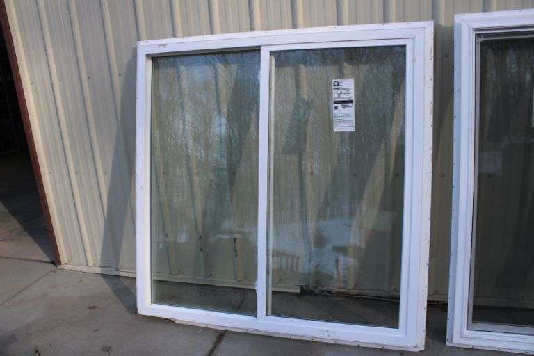 5' x 5' vinyl sliding window - Lee Real Estate & Auction Service