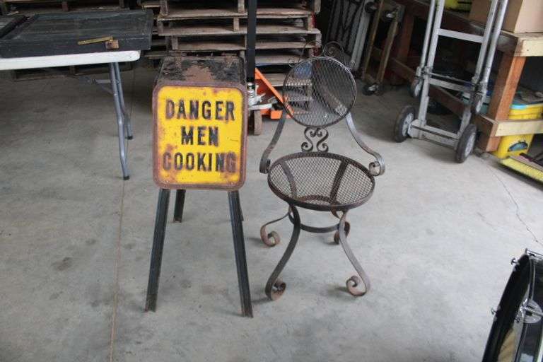 Wrought iron chair & Men cooking sign - Lee Real Estate & Auction Service