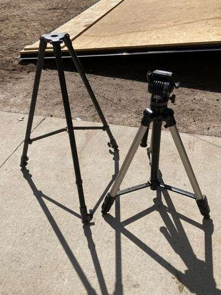 2 camera tripods - Lee Real Estate & Auction Service