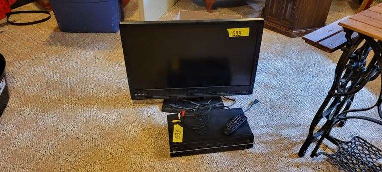 TV & VHS/DVD Player - Lee Real Estate & Auction Service