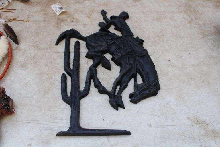 Cast iron Cowboy wall hanging - Lee Real Estate & Auction Service