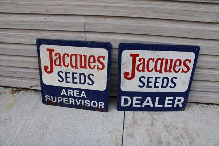 2 metal Jacques Seed double sided signs - Lee Real Estate & Auction Service