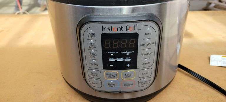 Insta-Pot Cooker (like new) - Lee Real Estate & Auction Service