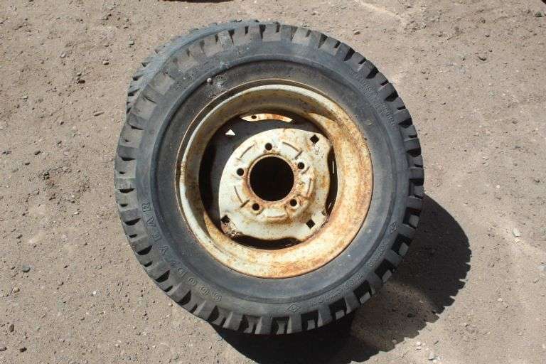 Pair of Goodyear lawn mower tires on rims - Lee Real Estate & Auction ...