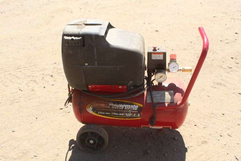 Coleman portable air compressor - Lee Real Estate & Auction Service