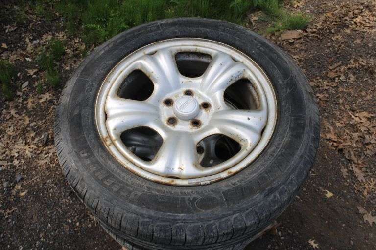 (4) 215/60R16 Tires on Rims - Lee Real Estate & Auction Service