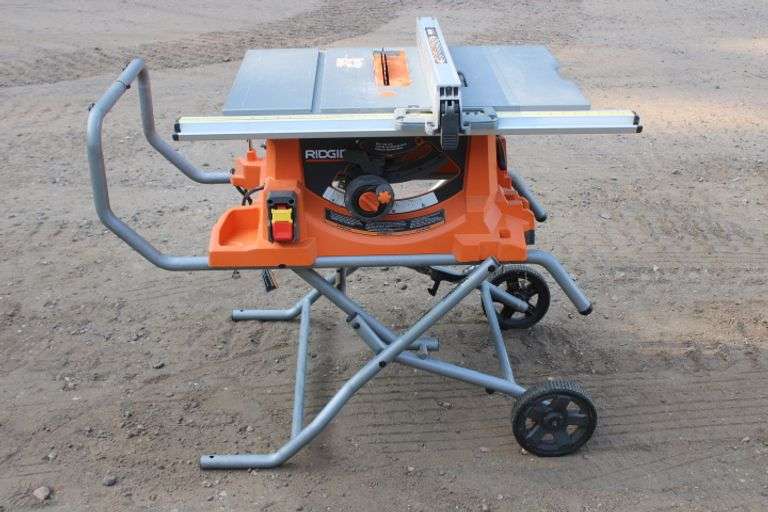 Ridgid 10" portable table saw w/stand - Lee Real Estate & Auction Service