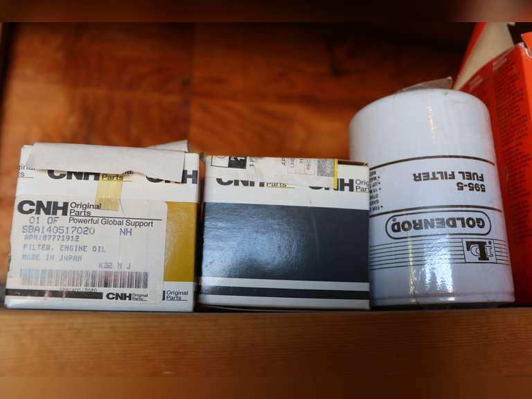 Oil filters on shelf - Adam Marshall Land & Auction, LLC