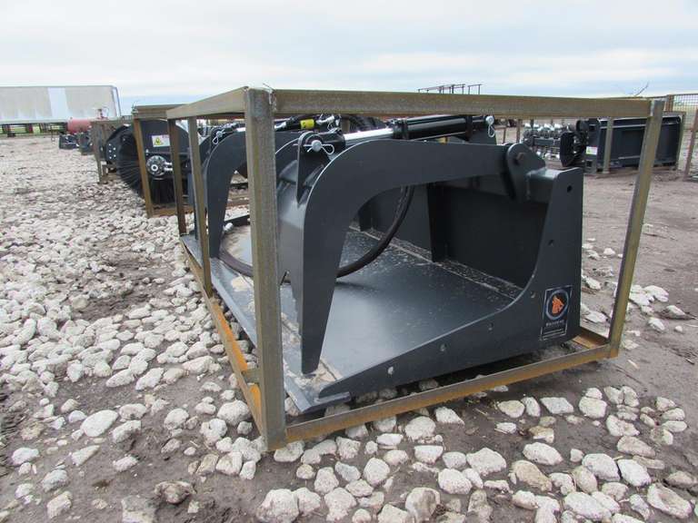 Unused Wolverine 72" grapple bucket for skid steer - Adam Marshall Land & Auction, LLC