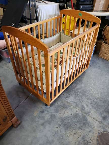 Wooden crib on wheels - Adam Marshall Land & Auction, LLC