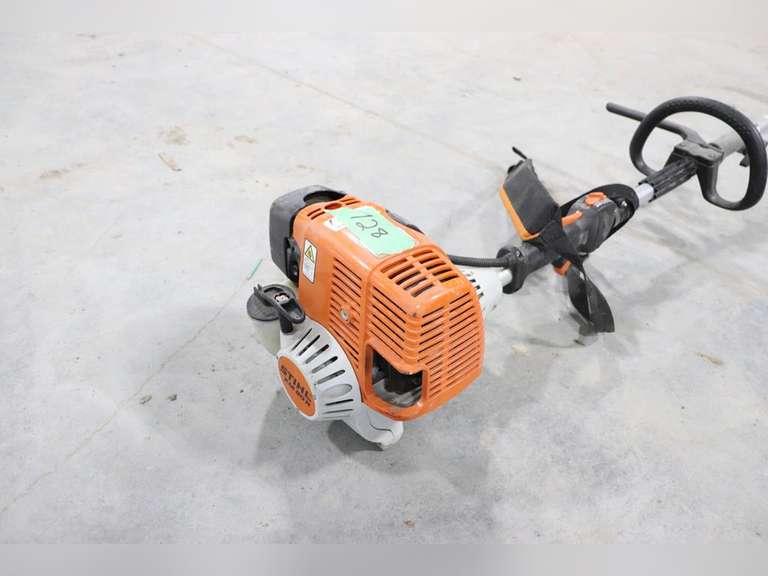 Stihl KM90R trimmer - Adam Marshall Land & Auction, LLC