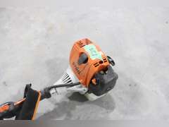 Stihl KM90R trimmer - Adam Marshall Land & Auction, LLC