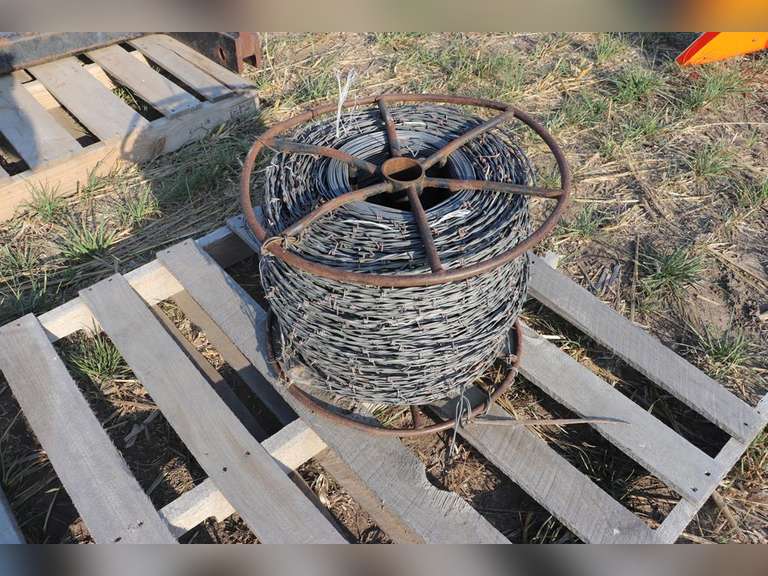 Roll of Barbed Wire on Spool - Adam Marshall Land & Auction, LLC