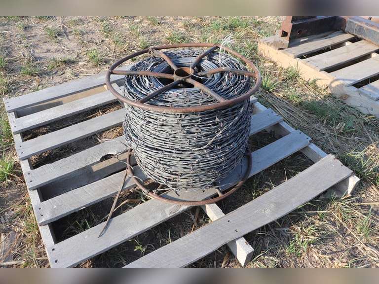 Roll of Barbed Wire on Spool - Adam Marshall Land & Auction, LLC
