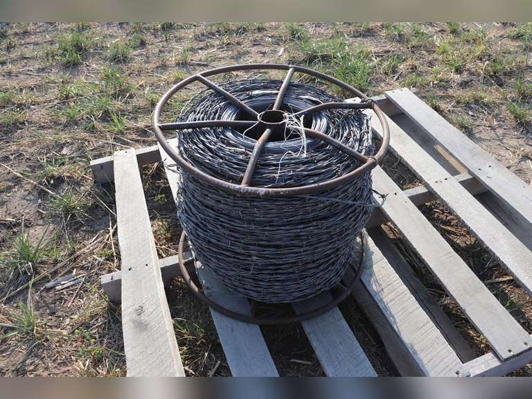 Roll of Barbed Wire on Spool - Adam Marshall Land & Auction, LLC
