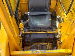 John Deere 675B skid steer - Adam Marshall Land & Auction, LLC