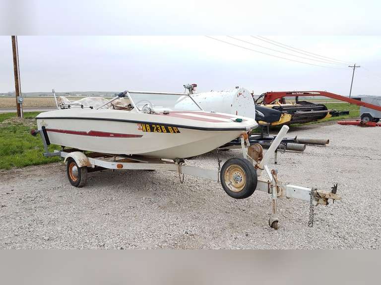Larson boat with 115 Evanrude outboard motor - Adam Marshall Land ...