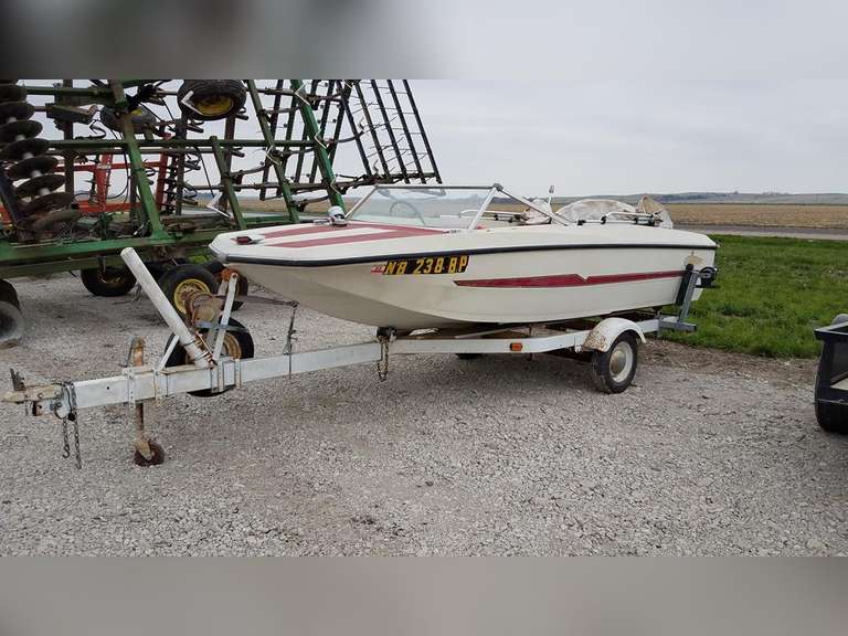 Larson boat with 115 Evanrude outboard motor - Adam Marshall Land ...
