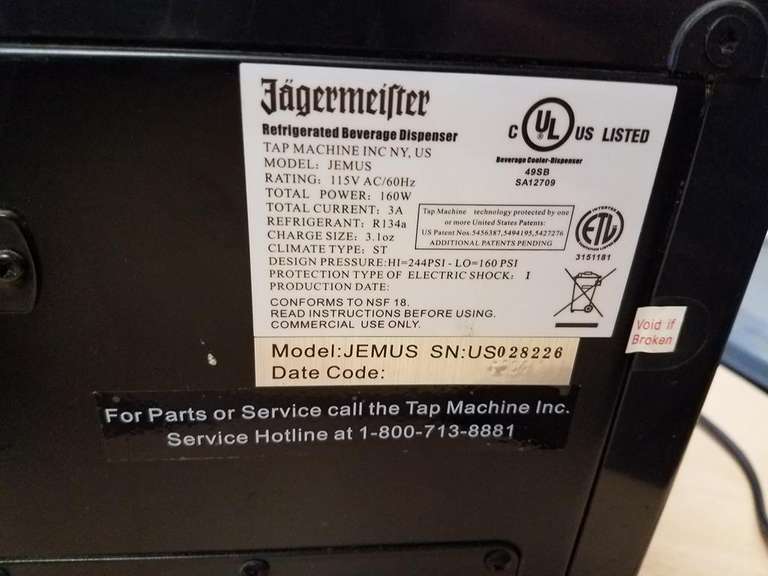 Jaeger Liquor dispenser - Adam Marshall Land & Auction, LLC