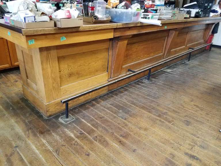 Wooden bar with foot rest, 254", 41" wide at end, 28" on one end, bar ...