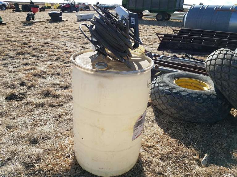 50 Gallon Barrel with pump & hose - Adam Marshall Land & Auction, LLC