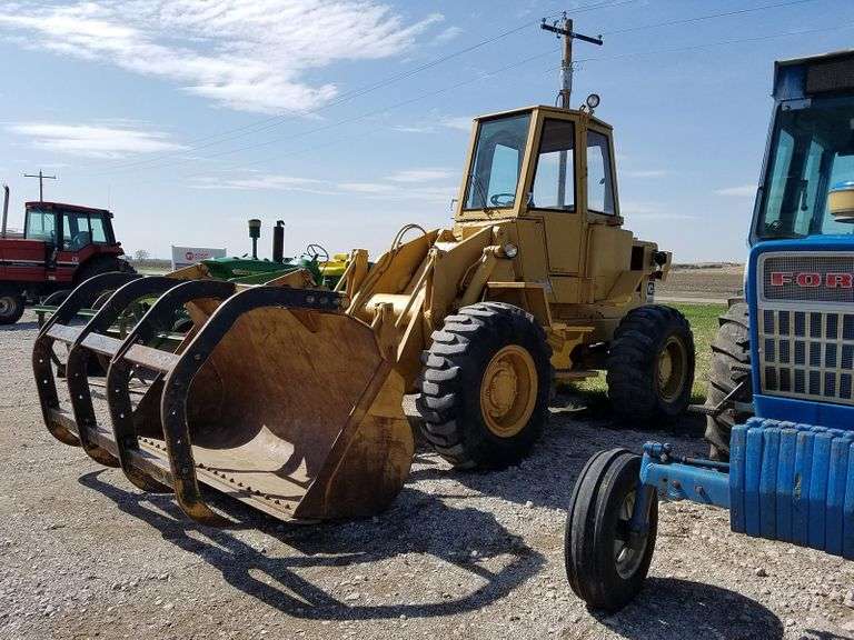 Caterpillar 930D Wheel Loader - Adam Marshall Land & Auction, LLC