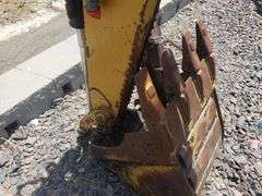 Caterpillar BH160 Skidsteer Backhoe Attachment - Adam Marshall Land ...