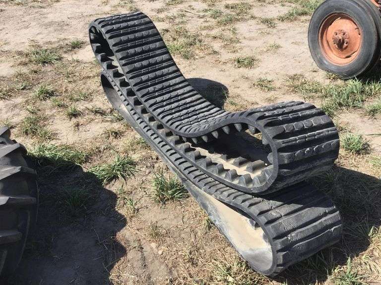 (2) 15" Wide Skid Steer Tracks - Adam Marshall Land & Auction, LLC