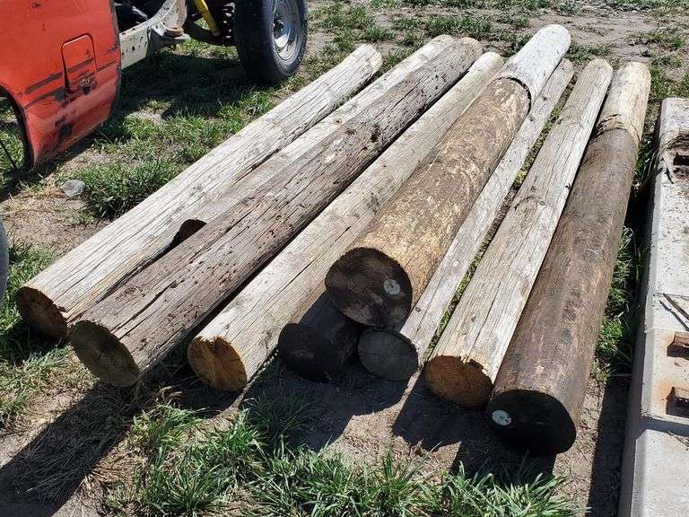 (10) 10' Wood Posts 7-9" - Adam Marshall Land & Auction, LLC
