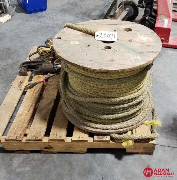 Large spool of heavy duty rope - Adam Marshall Land & Auction, LLC