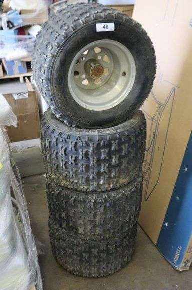 Four Wheeler Wheels and Tires - Matthews Auctioneers