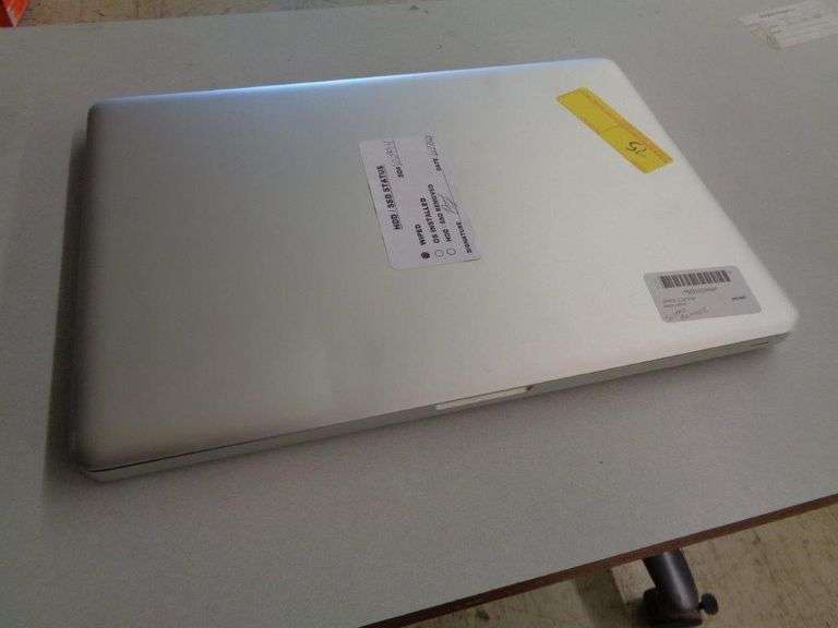 1 -APPLE LAPTOP -- DAMAGED DISPLAY - Matthews Auctioneers