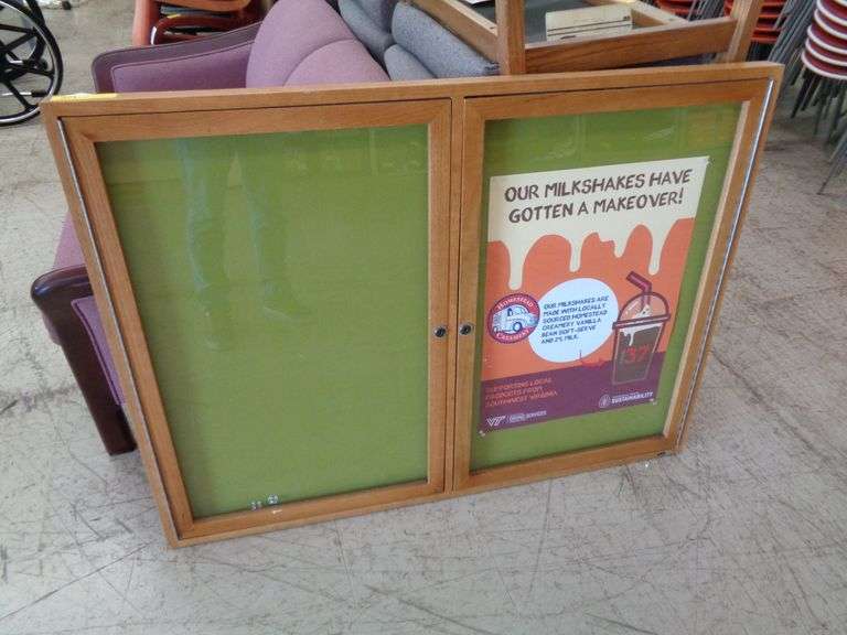 1 -WALL MOUNTED DISPLAY BOARD - Matthews Auctioneers