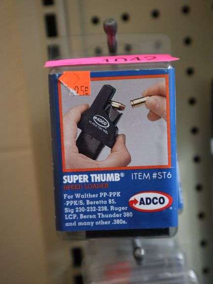 4 SUPER THUMB SPEED LOADERS - Matthews Auctioneers