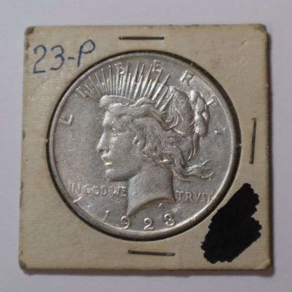 1823 Peace Dollar - Matthews Auctioneers