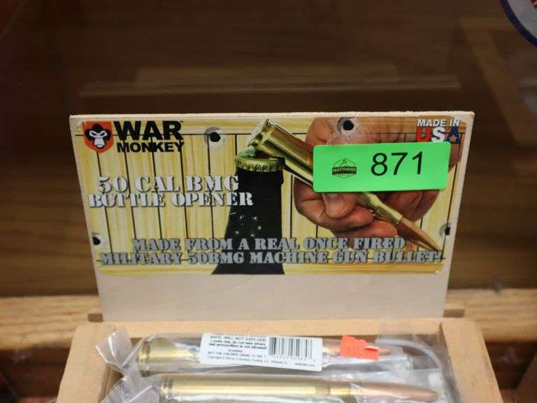 50 CAL BMGH BOTTLE OPENERS W/ DISPLAY - Matthews Auctioneers