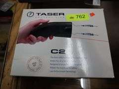 C2 TASER GUN - Matthews Auctioneers