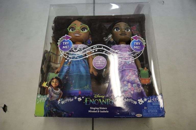Disney encanto singing sisters mirabel and isabela - Matthews Auctioneers