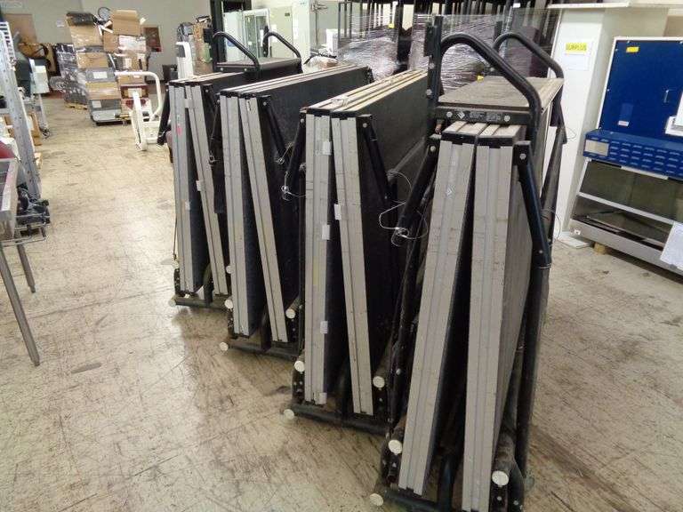 1 EACH-PORTABLE STAGE/ RIZER (4 CARTS) - Matthews Auctioneers