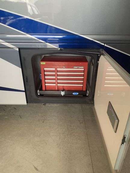 RV battery/utility slide out tray - Matthews Auctioneers