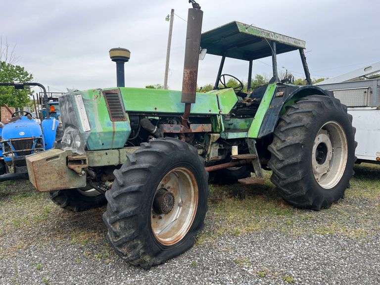 Deutz Open Cab Tractor Model DX 140 - Matthews Auctioneers