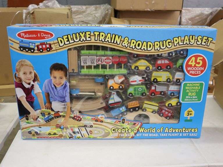 Melissa and Doug deluxe train and road rug play set - Matthews Auctioneers