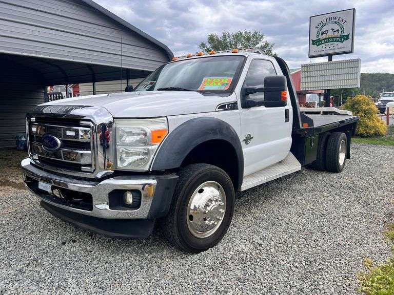 2012 Ford F-450 Diesel Truck w/ 11ft CM Flatbed - Matthews Auctioneers