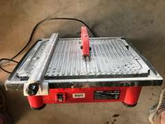 Husky Tile Saw, Mod. THD750L - Musser Bros Inc