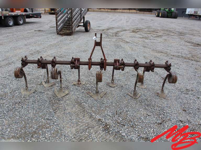 Cultivator, 9’, 3pt, spring shank, sweeps - Musser Bros. Inc.
